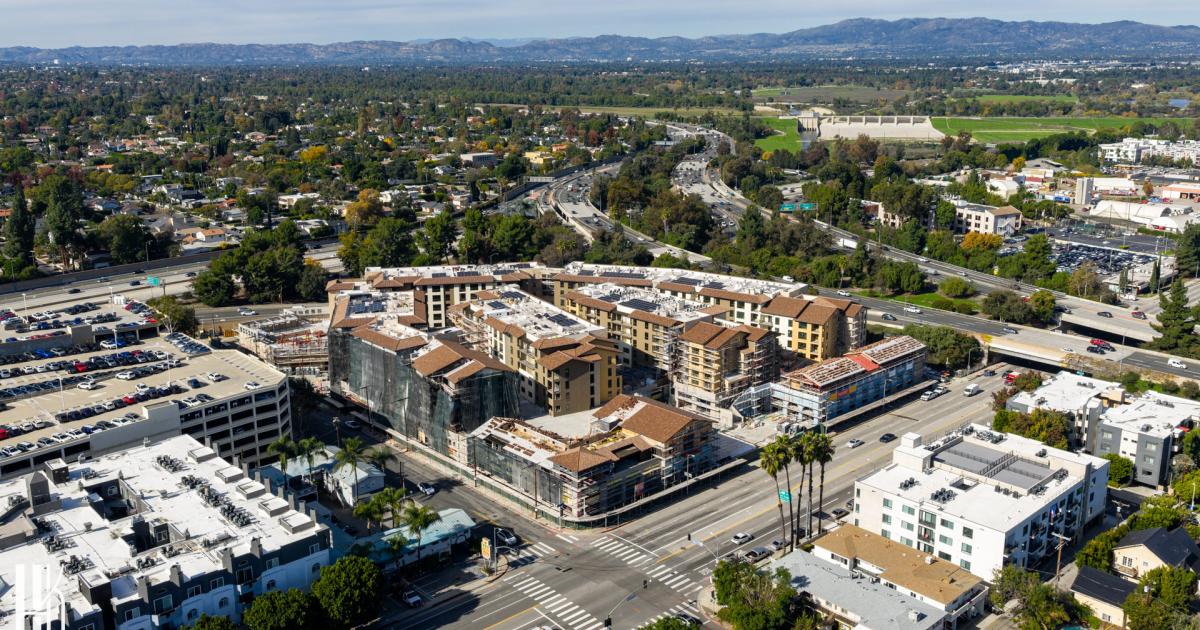 Wrapping off for Via Avanti apartments at 4827 N. Sepulveda Blvd. in ...